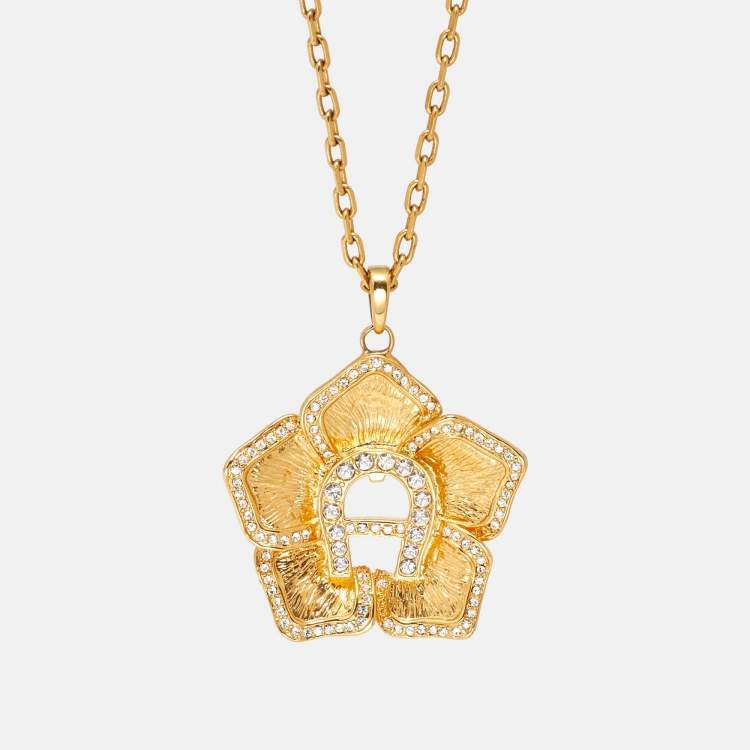Aigner Gold Tone Crystal Logo Flower Pendant Necklace Aigner | The ... Aigner Gold Tone Crystal Logo Flower Pendant Necklace Aigner | The ...