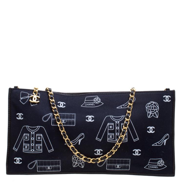 Chanel Dark Blue Symbol Printed Fabric Pochette Chanel | The Luxury Closet